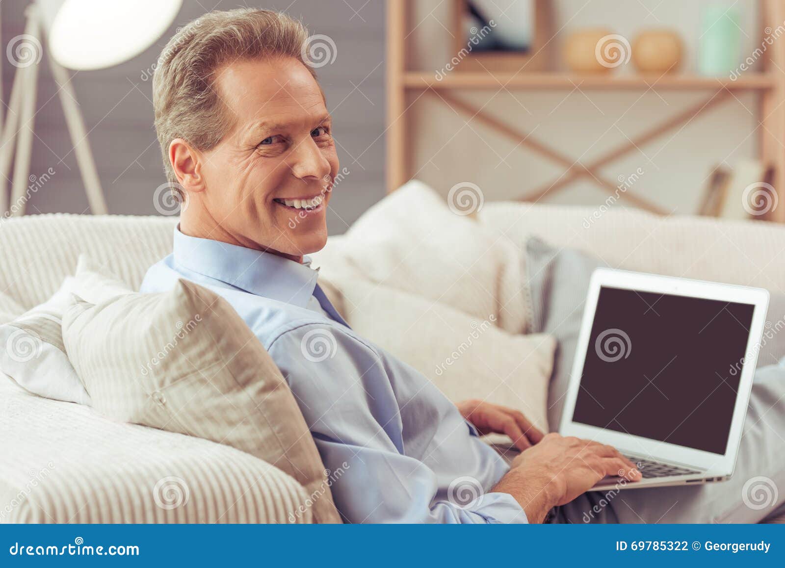 Middle aged man working stock photo. Image of lifestyle - 69785322