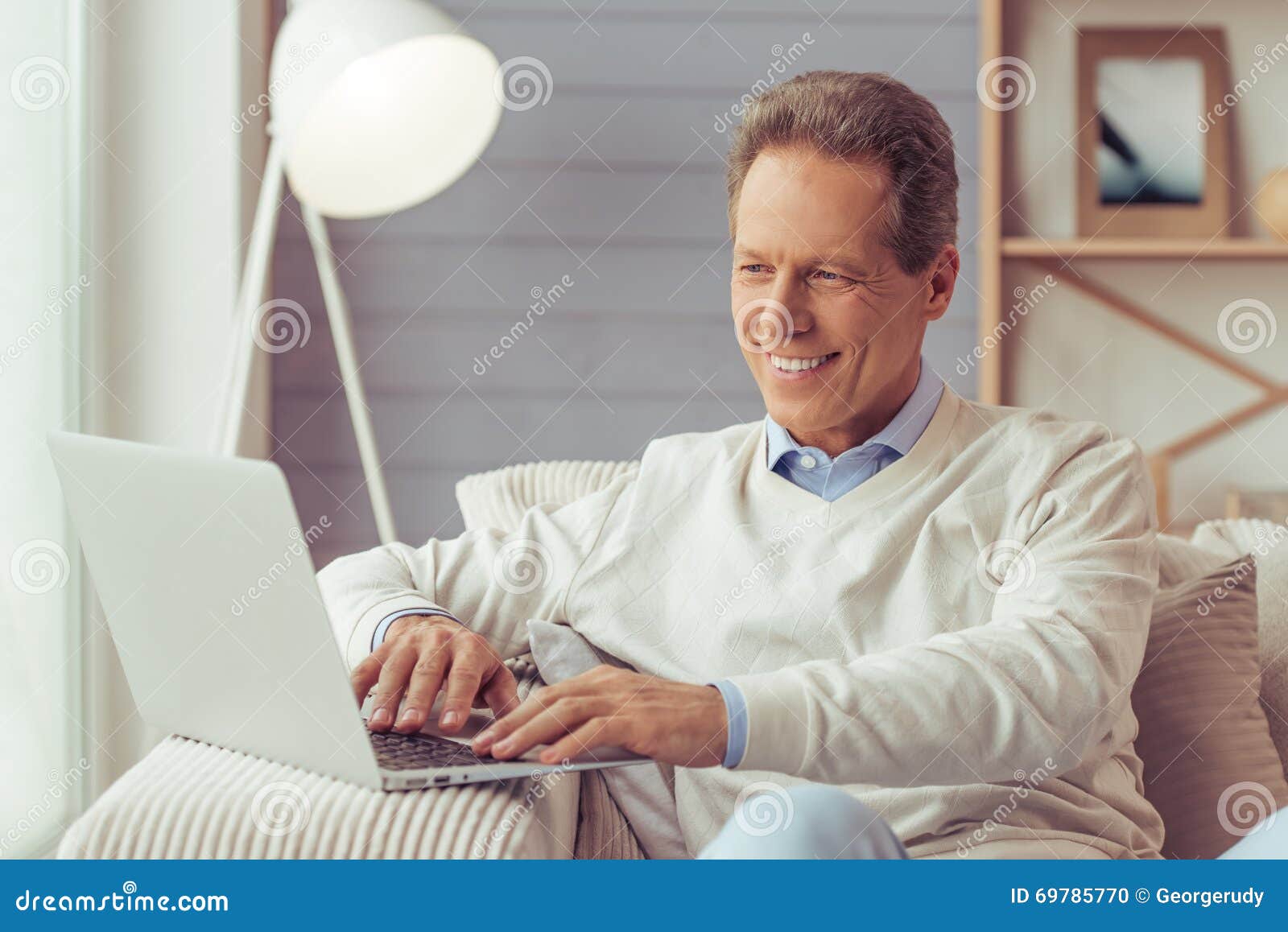 Middle aged man working stock photo. Image of happy, expression - 69785770