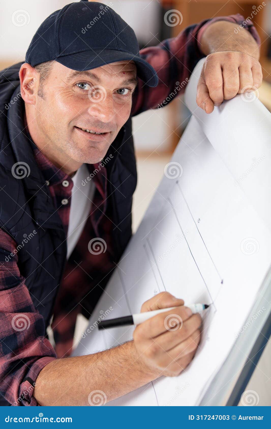 Middle-aged Workman Drawing Design on Flip Chart Stock Image - Image of ...