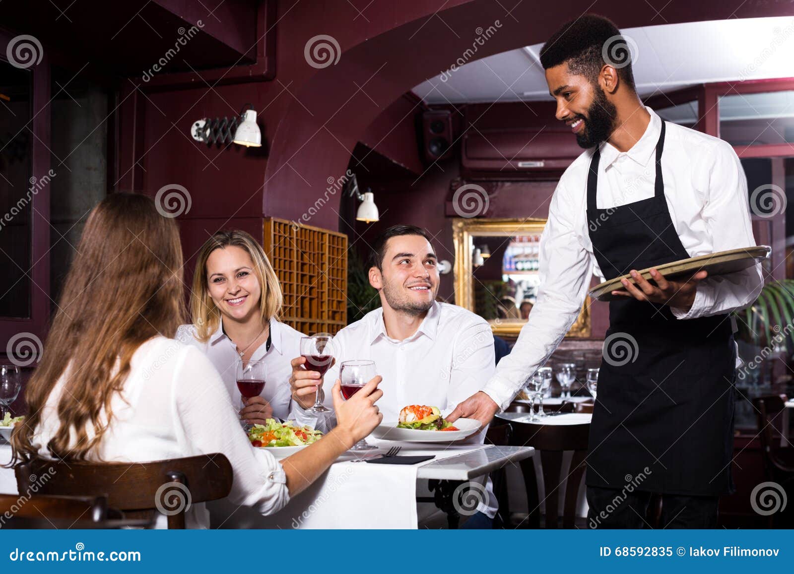 Middle Class Restaurant and Cheerful Waiter Stock Image - Image of ...