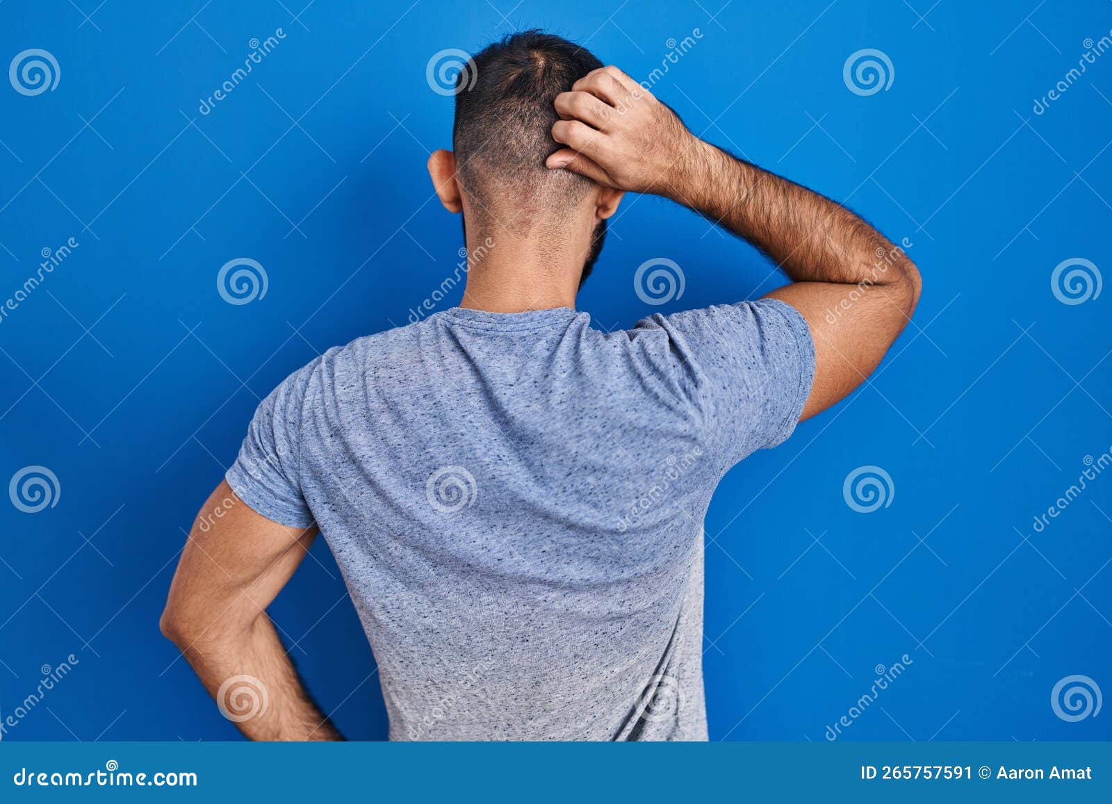 Middle East Man with Beard Standing Over Blue Background Backwards ...