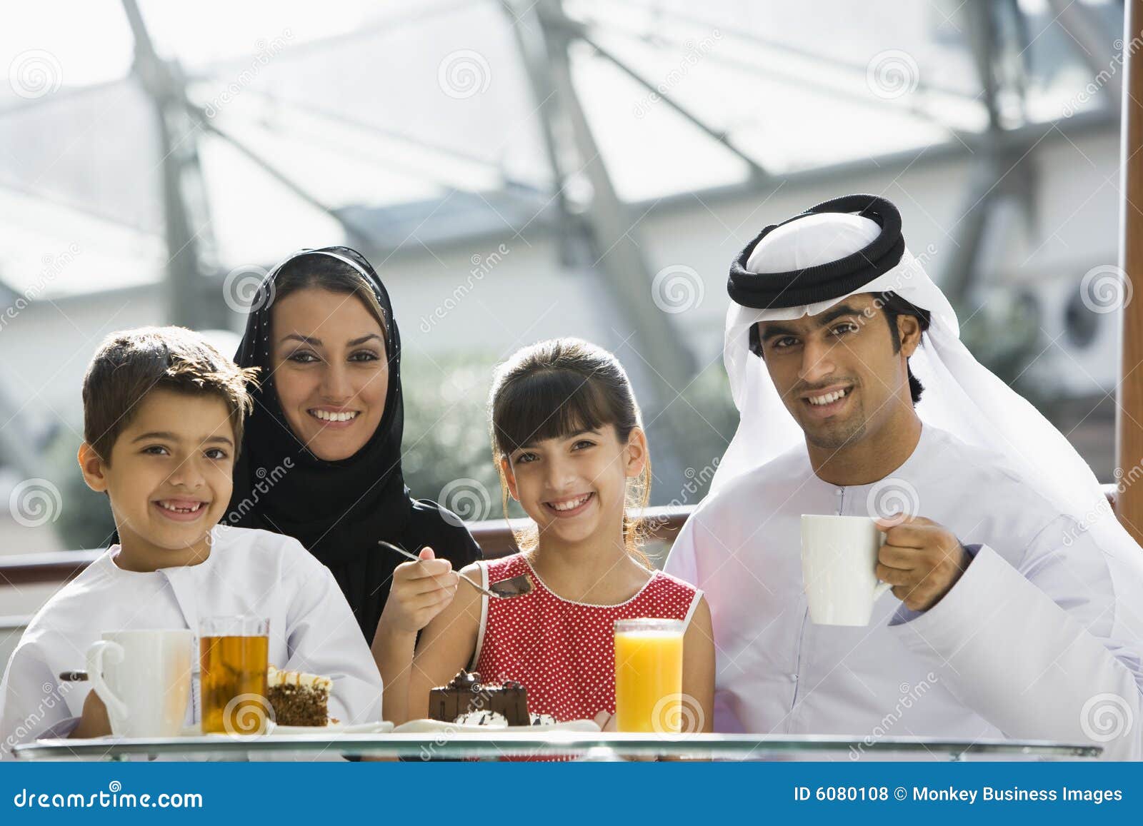 A Middle Eastern Family Enjoying a Meal Stock Photo - Image of arabic ...