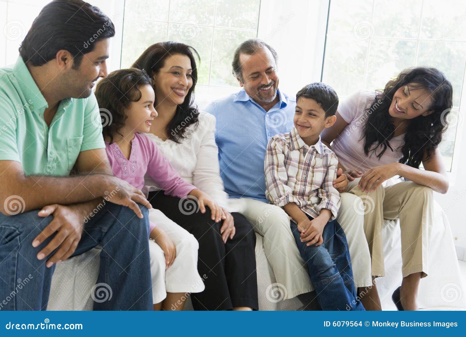 Middle Eastern Family Sitting Together Stock Photo - Image of indoors ...