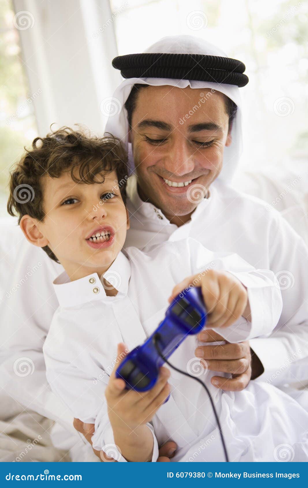 A Middle Eastern Father and Son Playing Stock Photo - Image of clothing ...