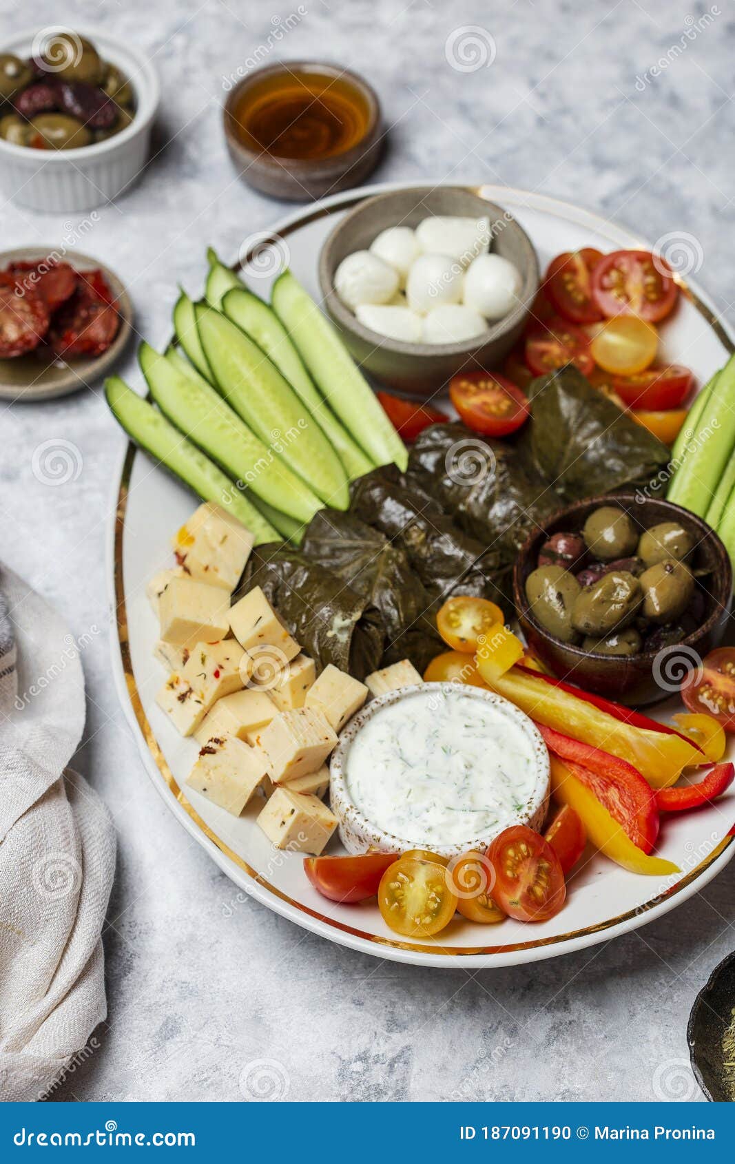 Middle Eastern Meze Platter with Vegetables, Crowd and Tzatziki Sauce ...
