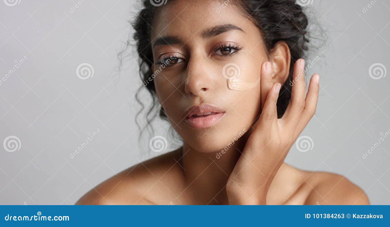 Middle Eastern Young Woman in Studio with a Foundation on Cheek Closeup ...