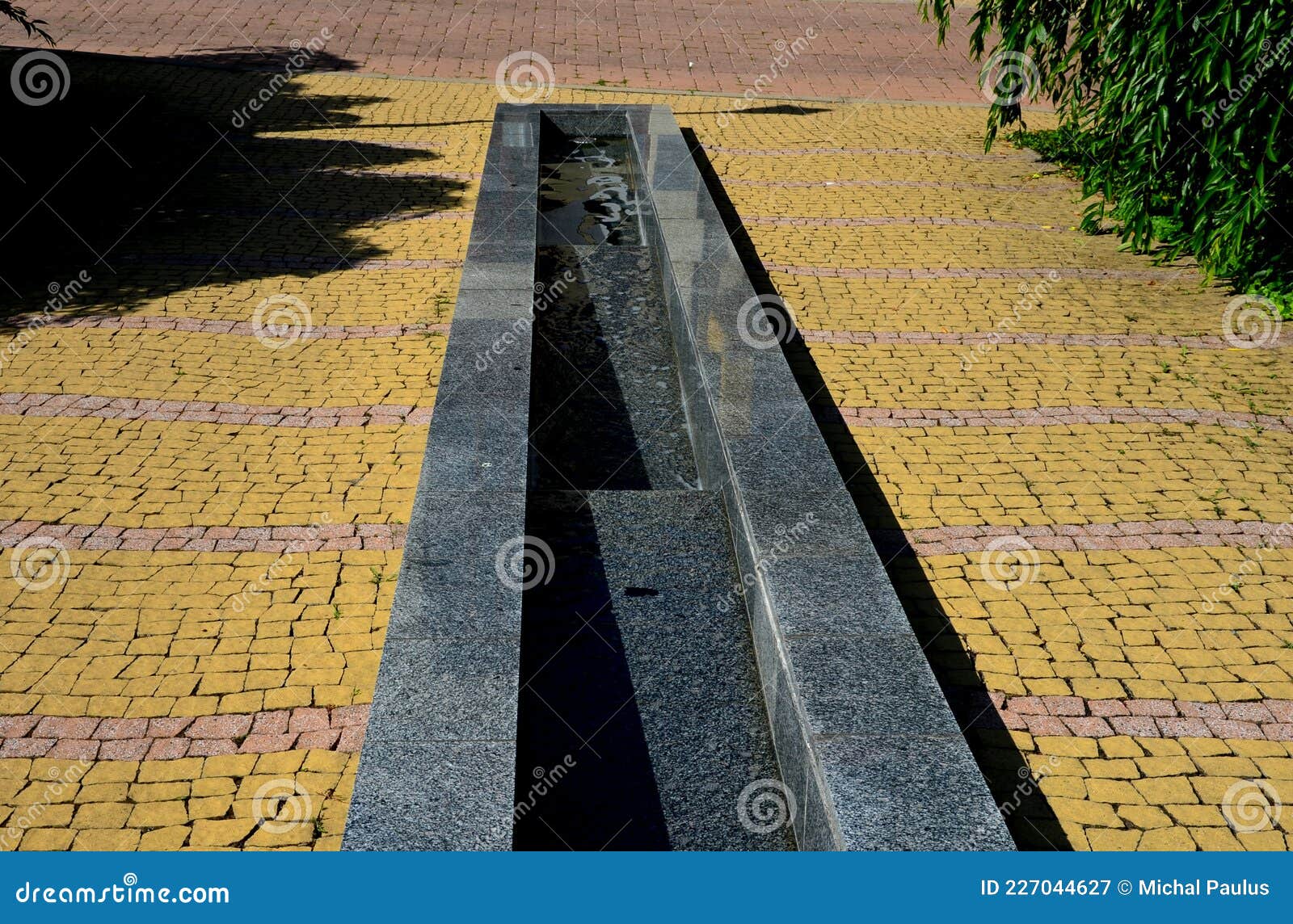 In the Middle of the Promenade There is an Artificial Stream in a ...