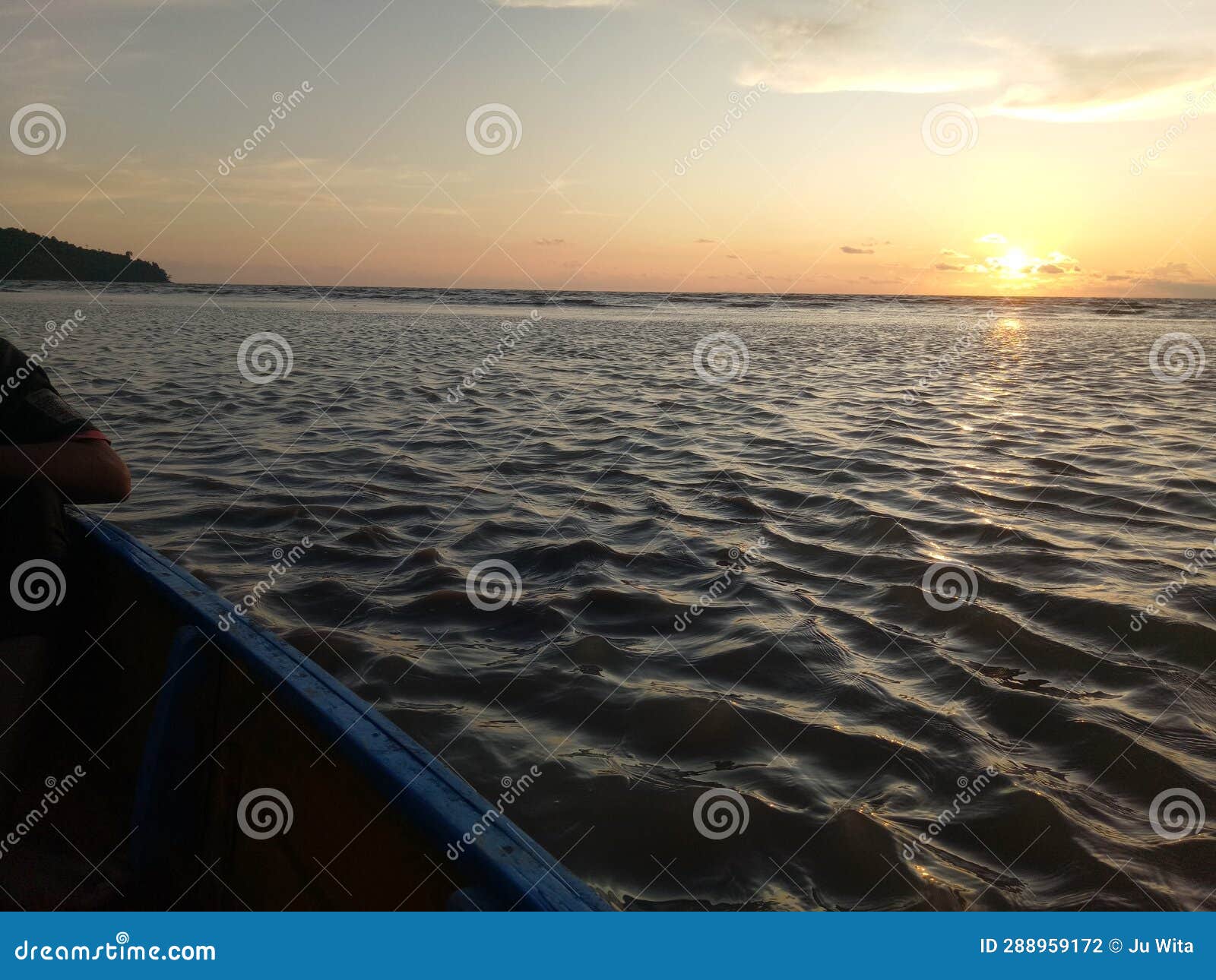 Middle of the sea stock photo. Image of evening, orange - 288959172
