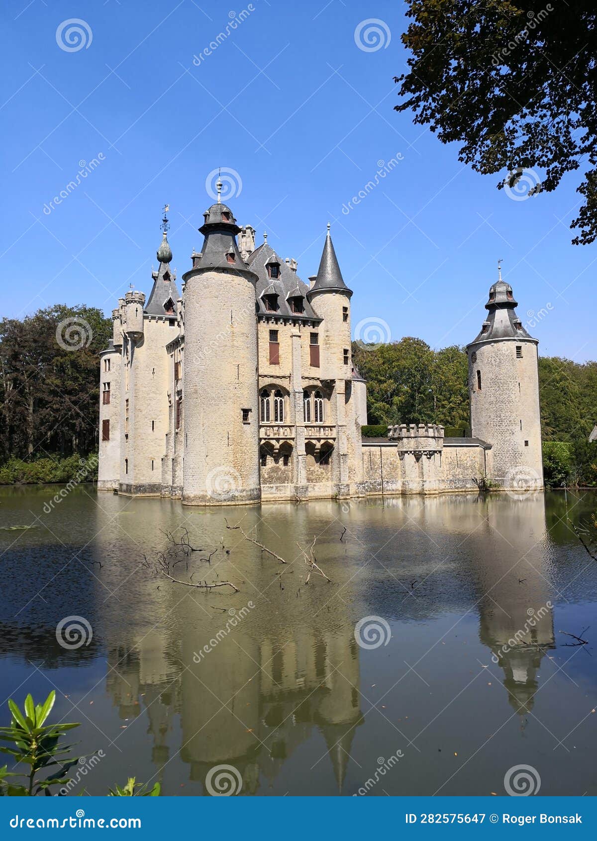 Mideaval Castle in a lake stock image. Image of lake - 282575647