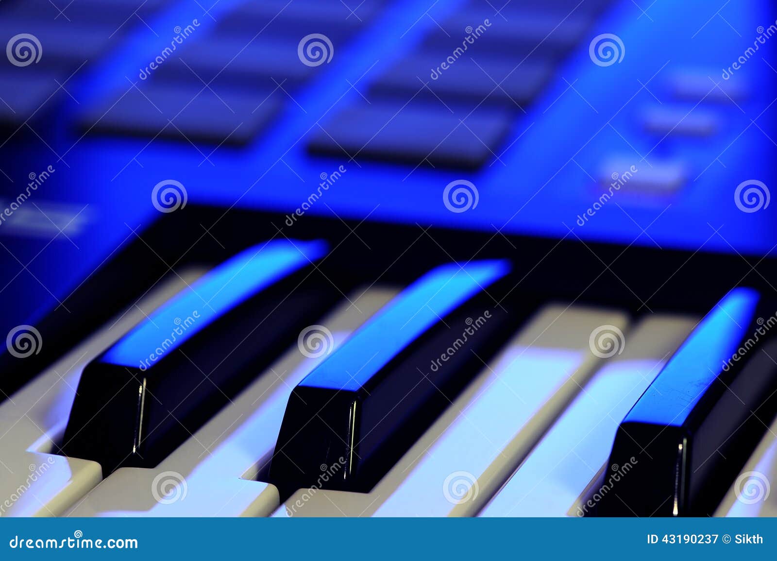 MIDI Controller Keyboard in Blue Light Stock Image - Image of improvise ...