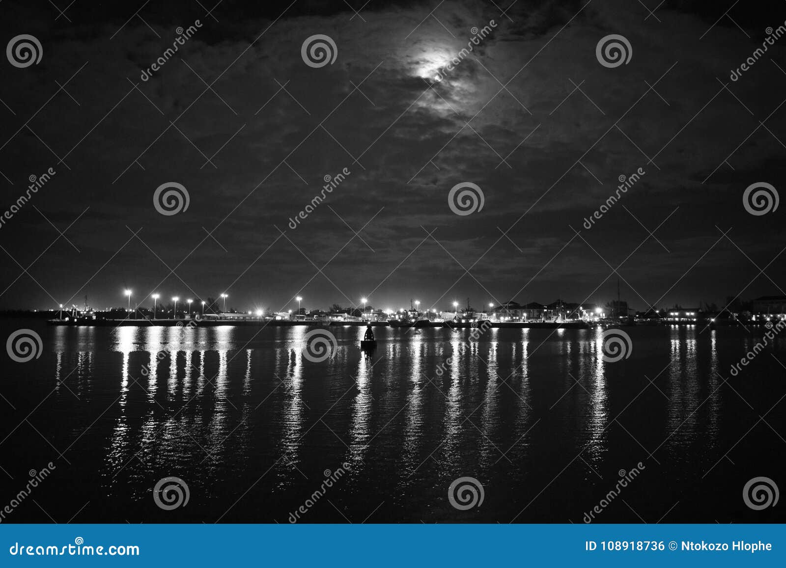 Midnight Lights and the Moon Stock Photo - Image of moon, waters: 108918736