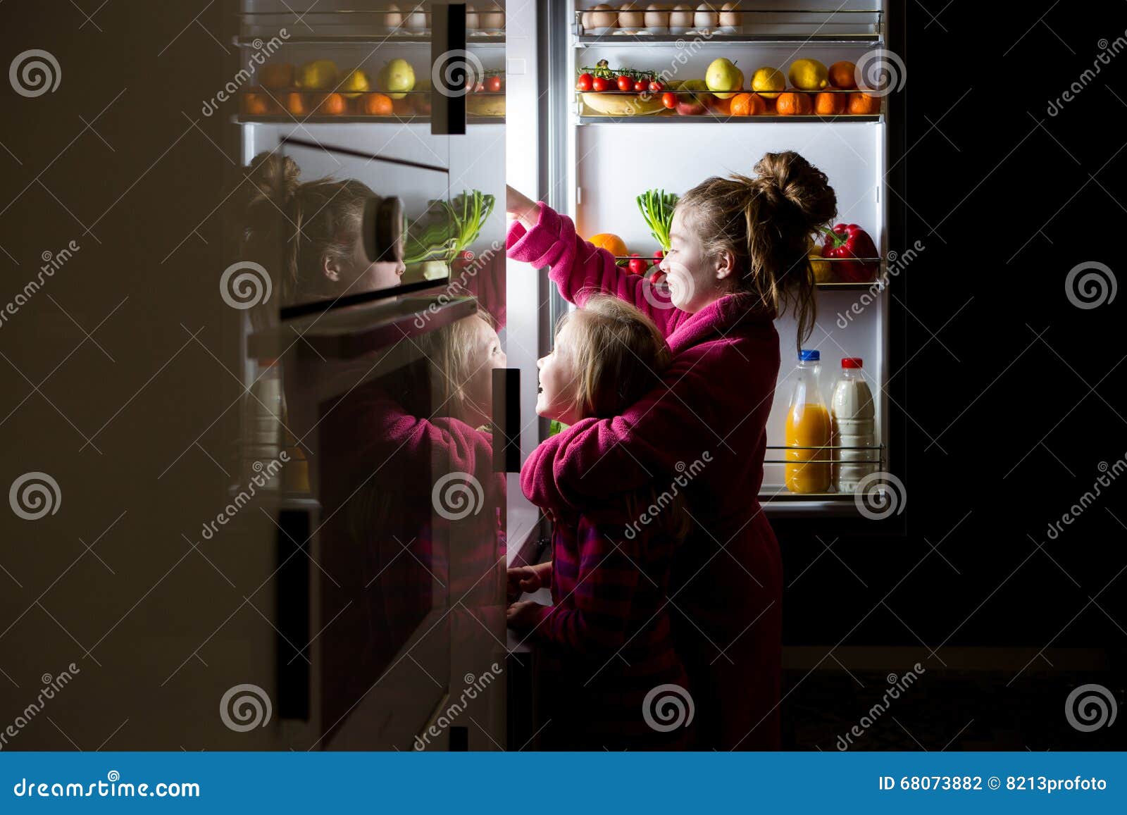 Midnight Snack, Looking into Fridge Stock Photo - Image of female, dark ...