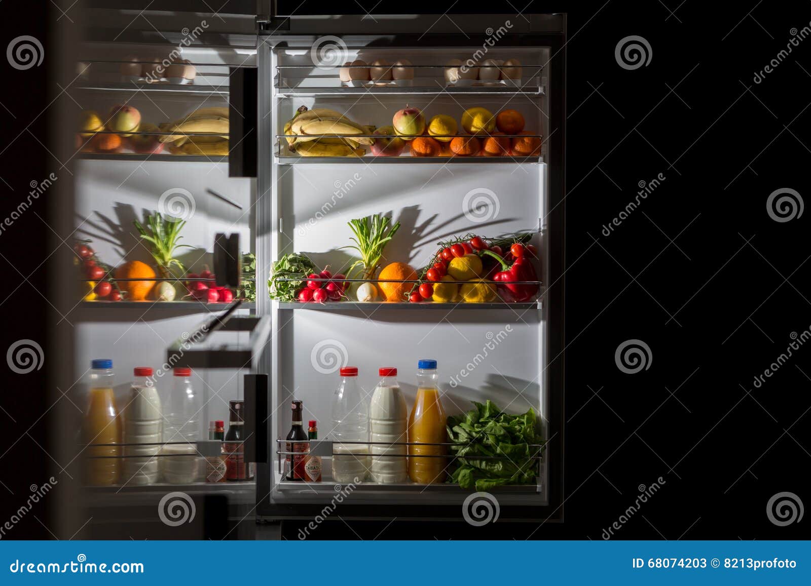 Midnight Snack, Looking into Fridge Stock Image - Image of date ...
