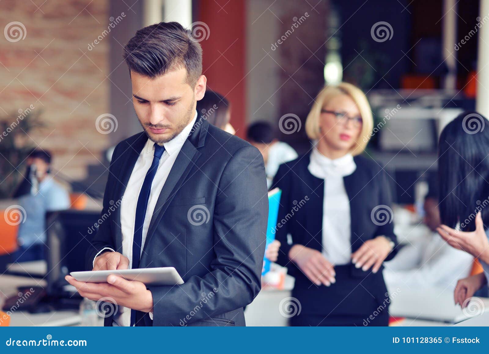 Midsection of Businessman Using Digital Tablet in Office Stock Image ... Midsection of Businessman Using Digital Tablet in Office Stock Image ...