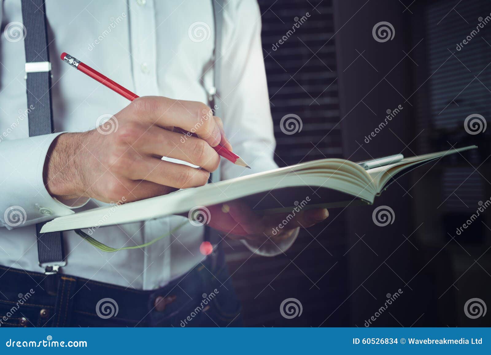 Midsection of Businessman Writing in His Notepad Stock Photo - Image of ...