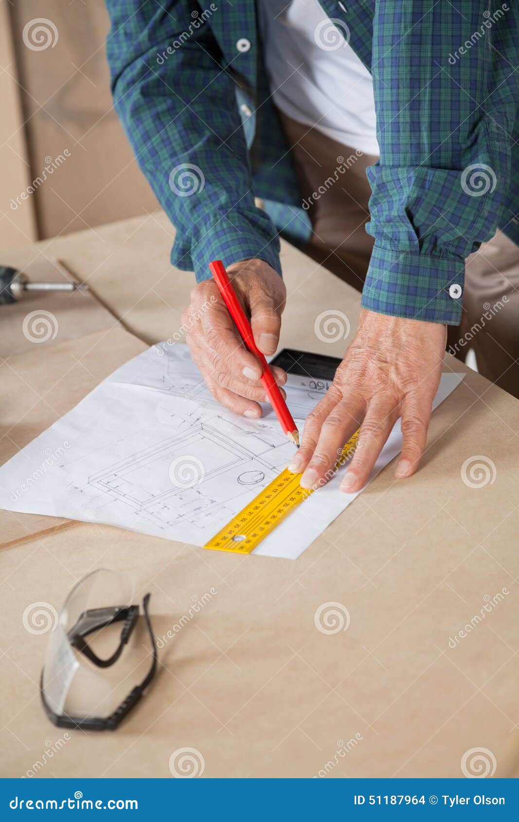 Midsection of Carpenter Drawing Blueprint at Table Stock Photo - Image ...