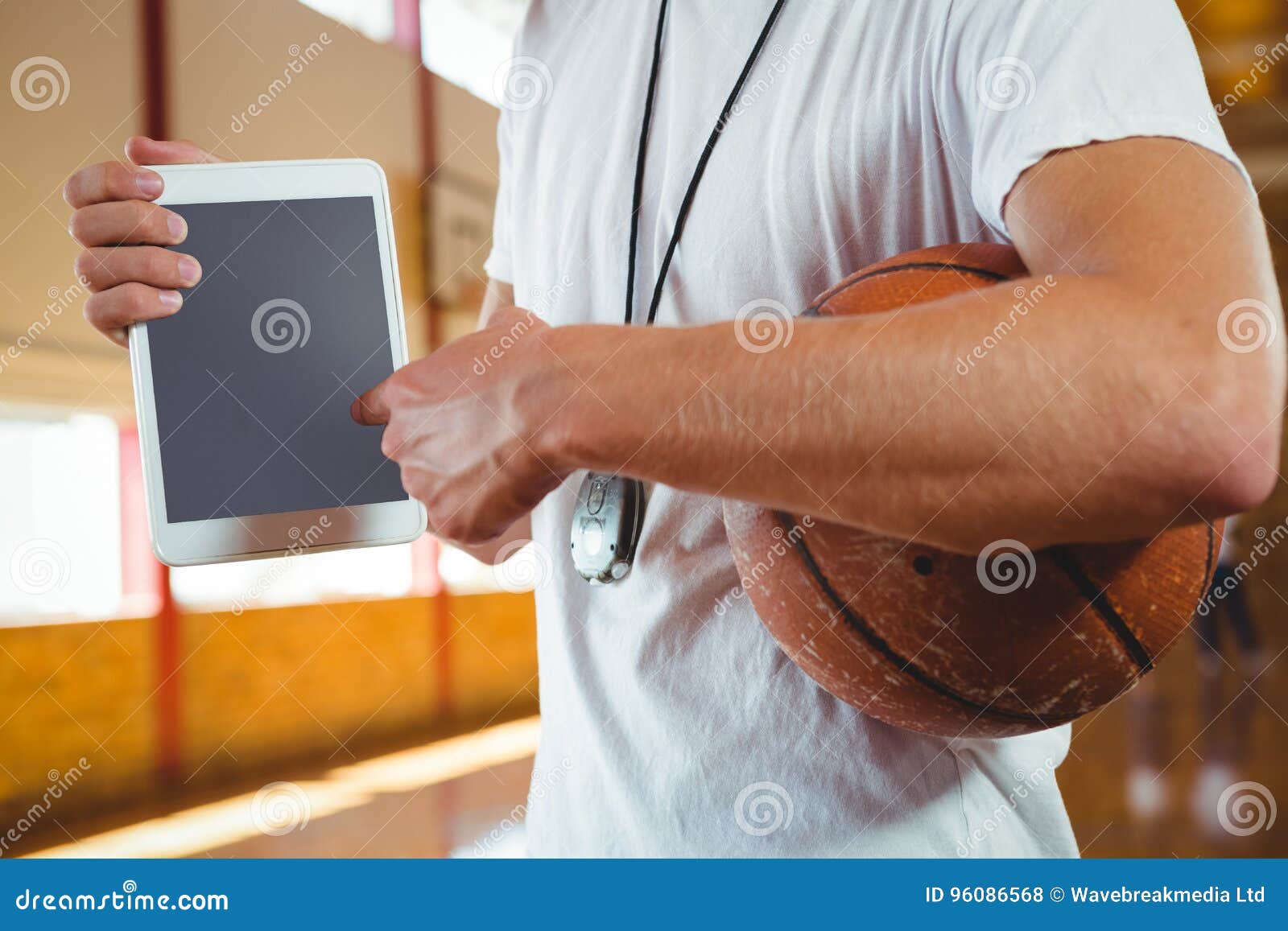 Midsection of Coach Showing Tablet Computer Stock Photo - Image of ...