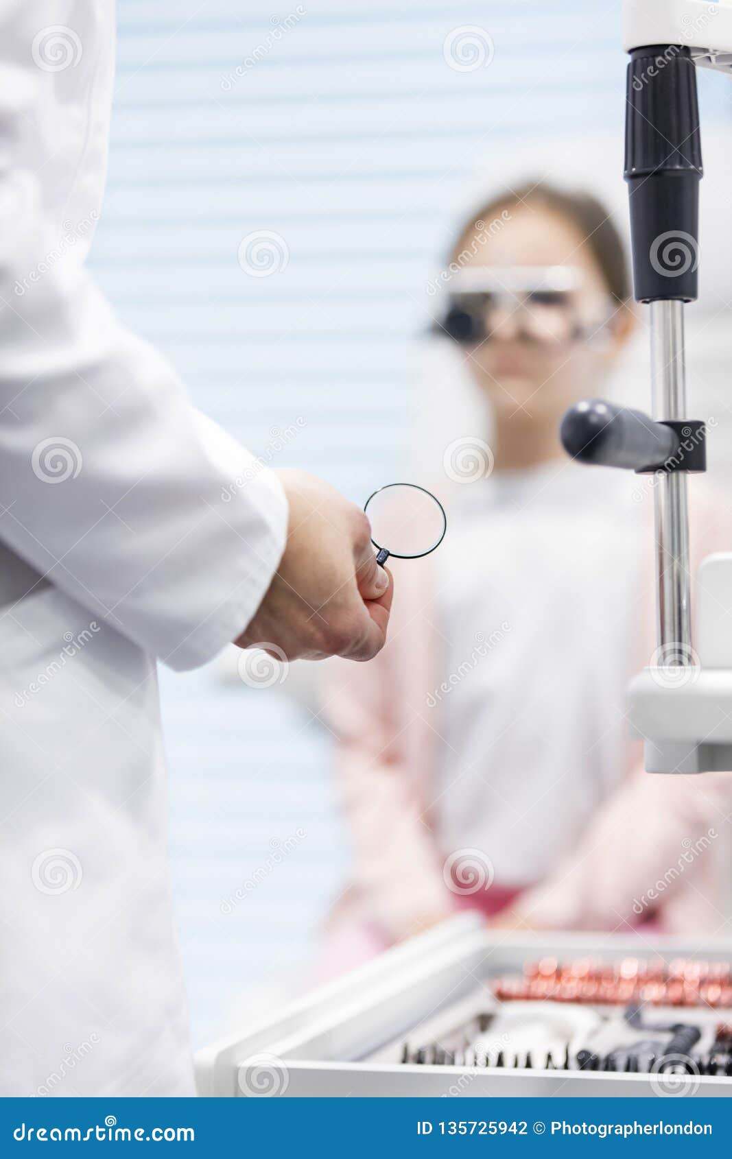 Midsection of Doctor Doing Eye Test at Hospital Stock Photo - Image of ...