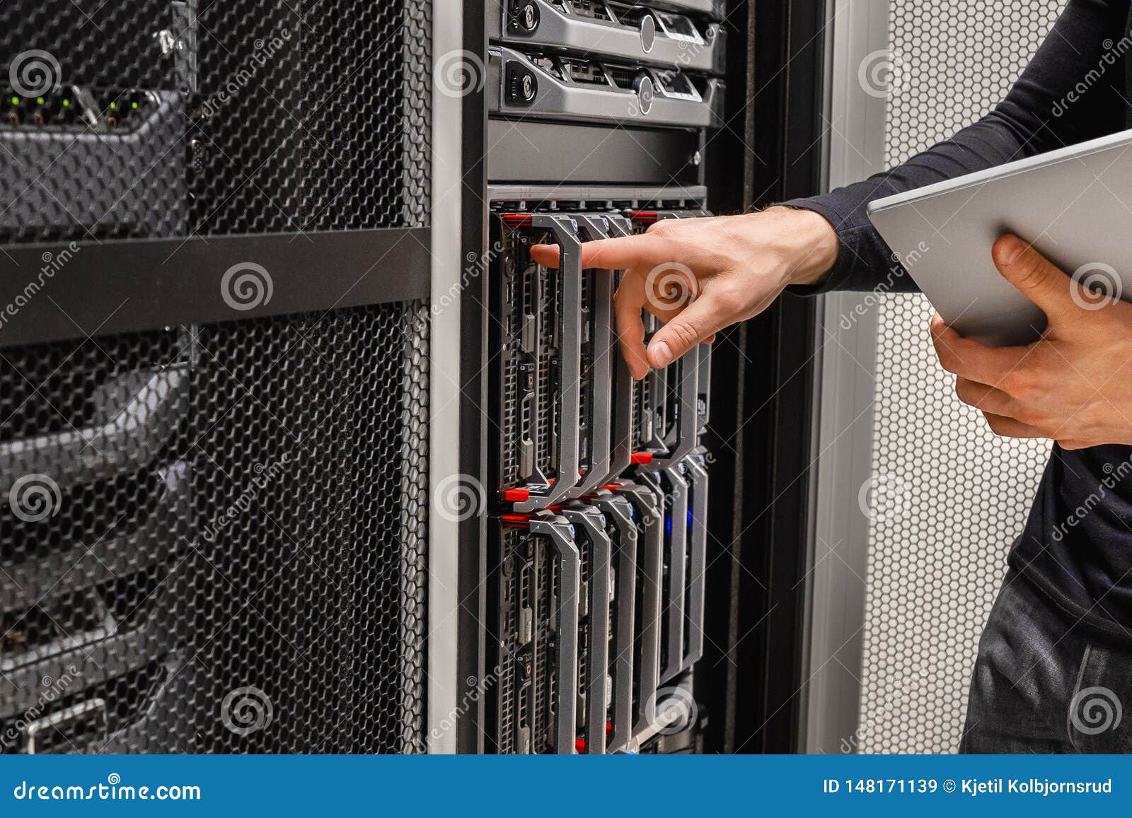 It Consultant Using Digital Tablet Troubleshoot Problems with Server ...