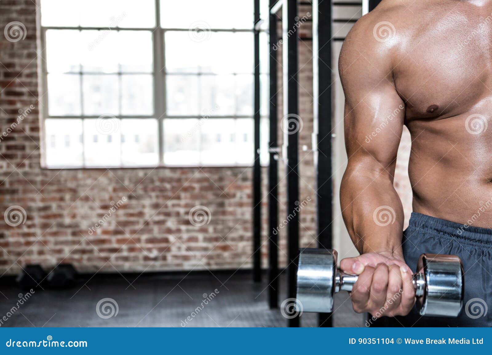 Midsection of Man Exercising with Dumbbells at Gym Stock Photo - Image ...