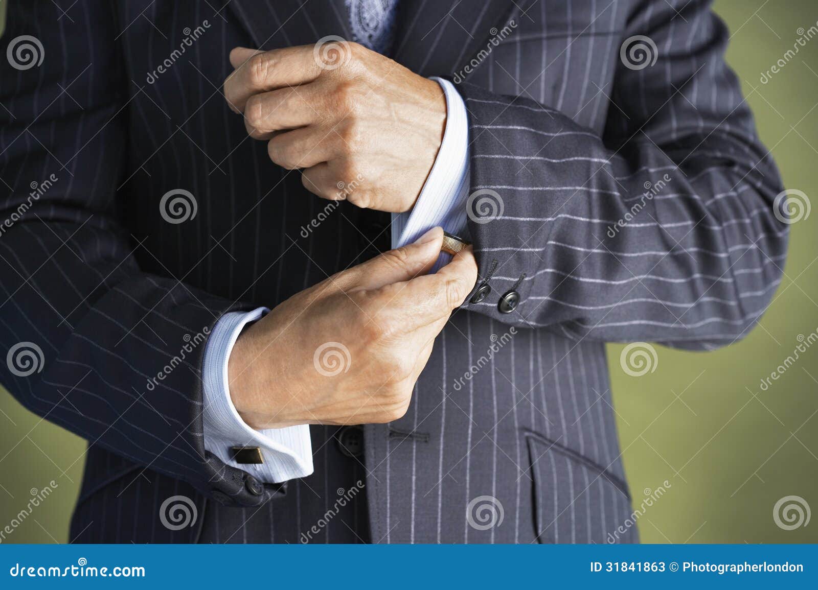 Midsection of Man in Suit Buttoning Cuff Sleeves Stock Image - Image of ...