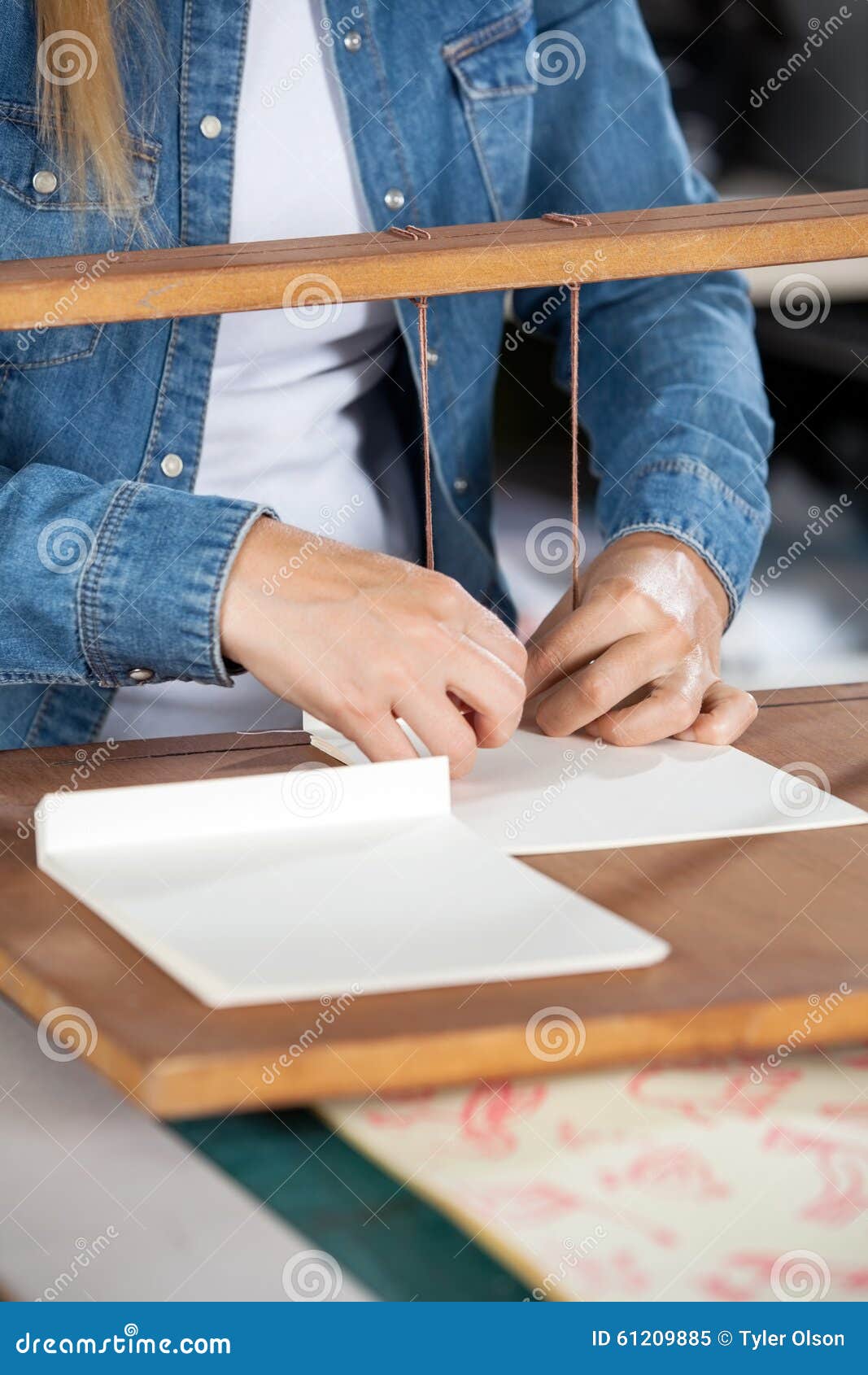 Midsection of Woman Binding Papers at Workbench Stock Image - Image of ...