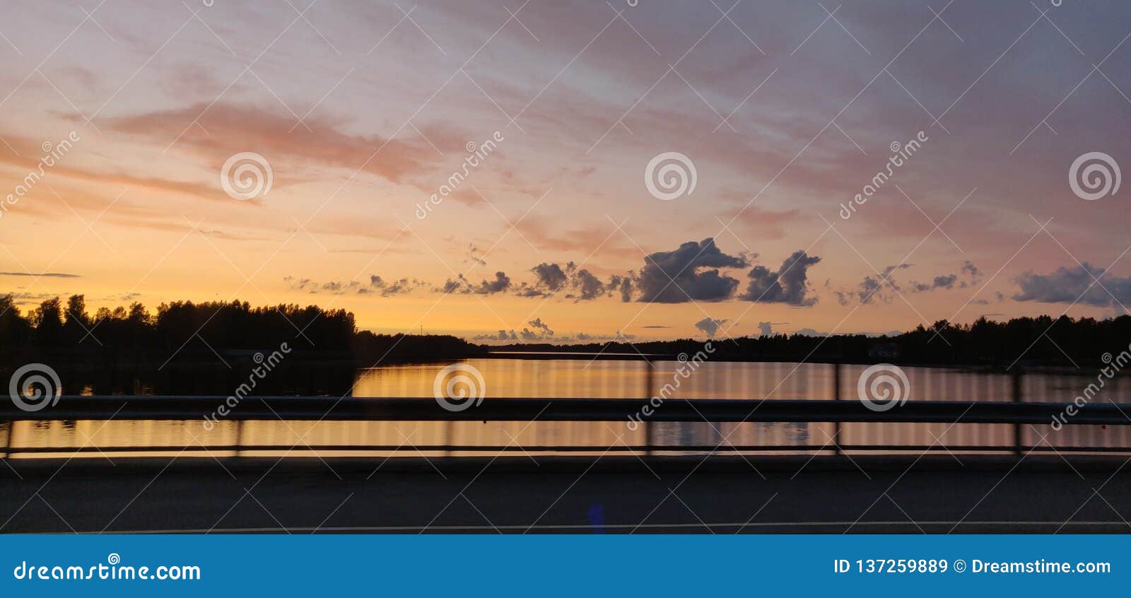 Midsummer Sunset Reflecting On Sea Slack Water Pool In Fouras, Charente ...