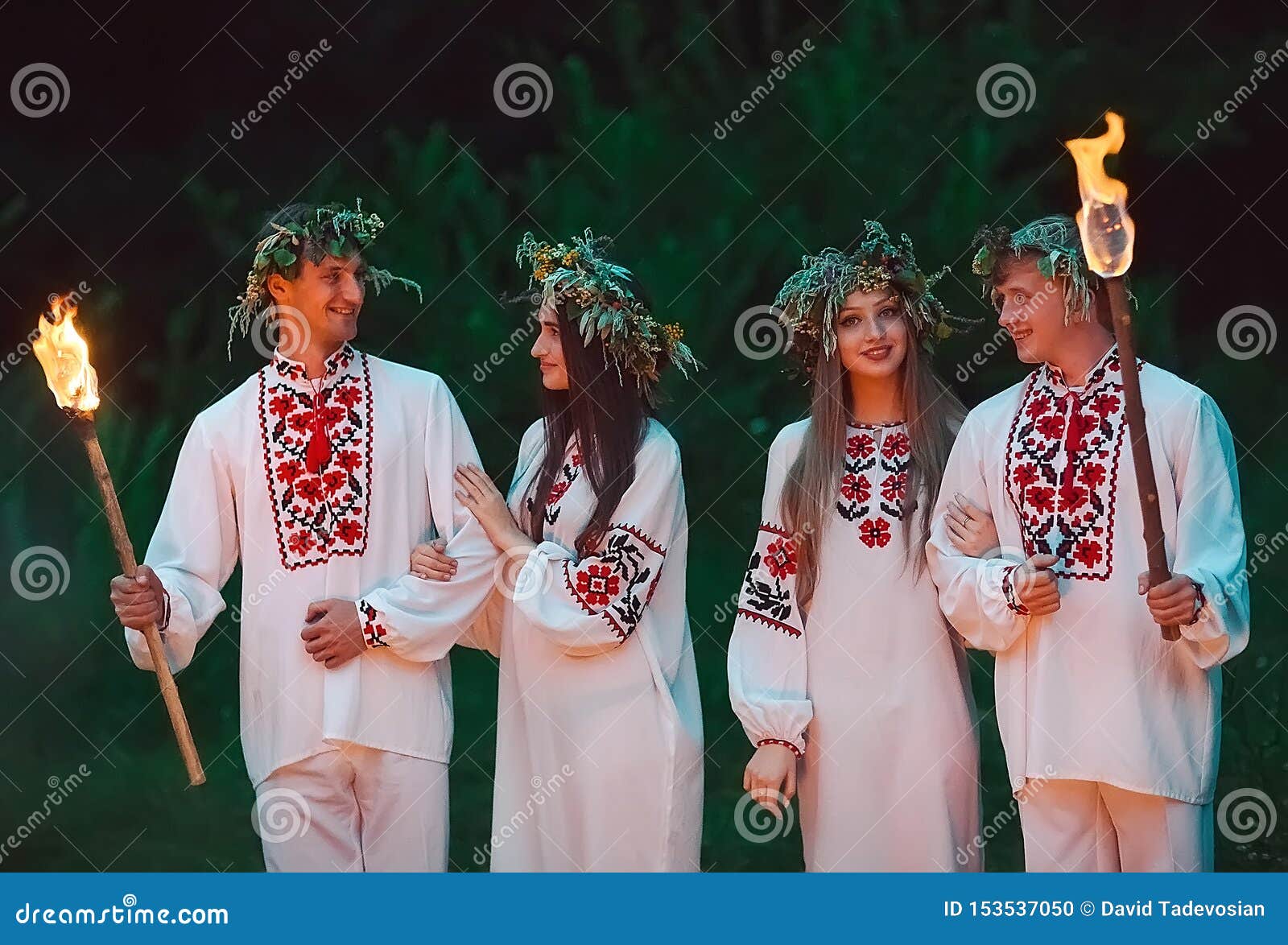 Midsummer. Young Loving Couple In Slavic Costumes On The Shore Of The ...