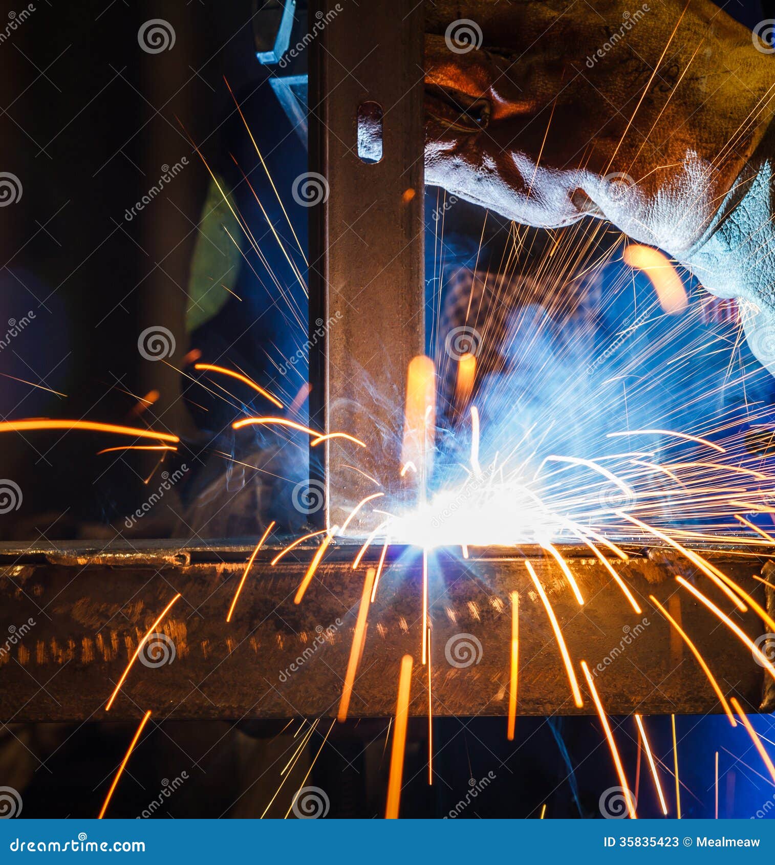 MIG welding in a factory stock image. Image of light - 35835423