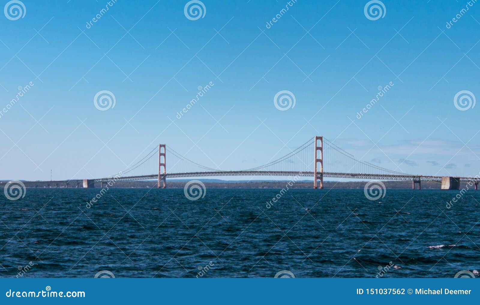 The Might Mackinac Bridge Standing Tall on the Horizon Editorial ...