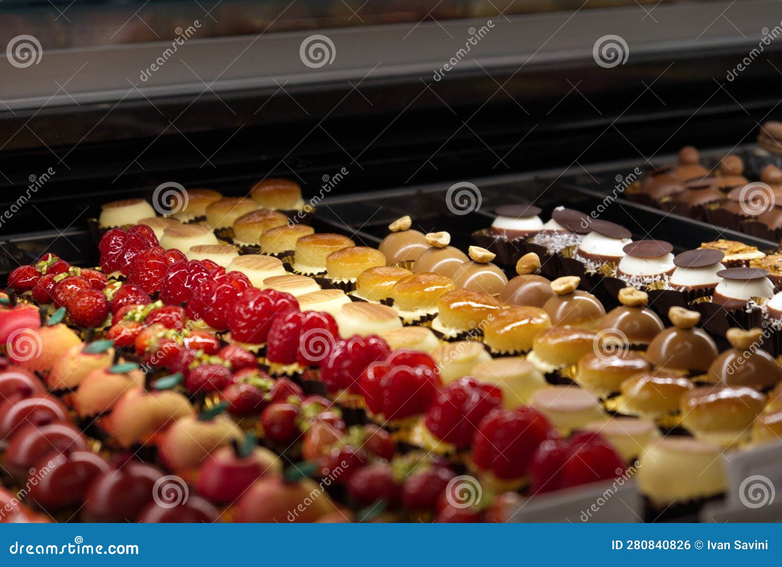 A Mignon High Pastry Showcase Stock Photo - Image of display, berry ...