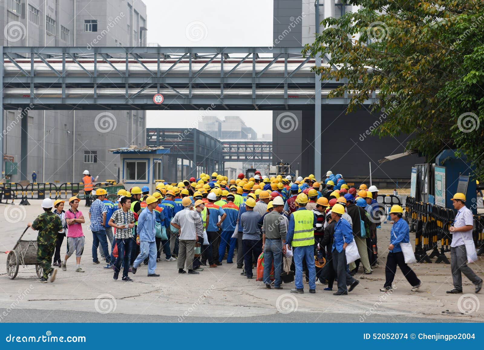 The migrant workers editorial stock image. Image of helmet - 52052074