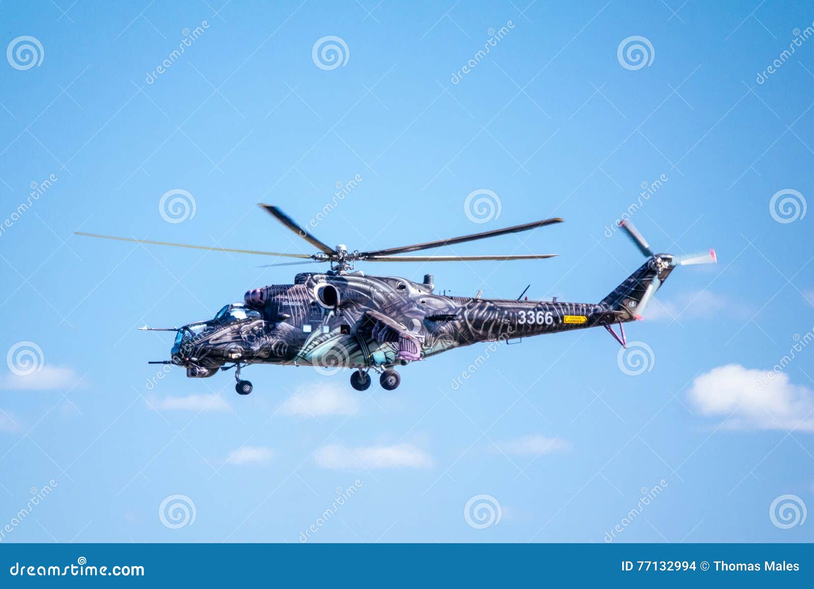 Mil Mi-24 Attack Helicopter Stock Photo - Image of clouds, midair: 77132994