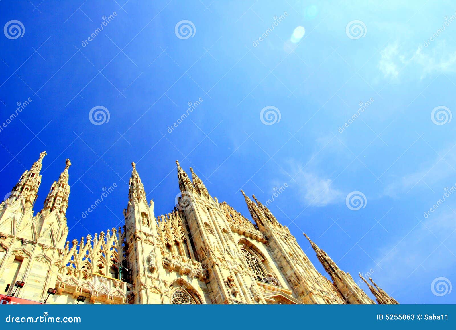 Milan Duomo on blue sky stock image. Image of italian - 5255063
