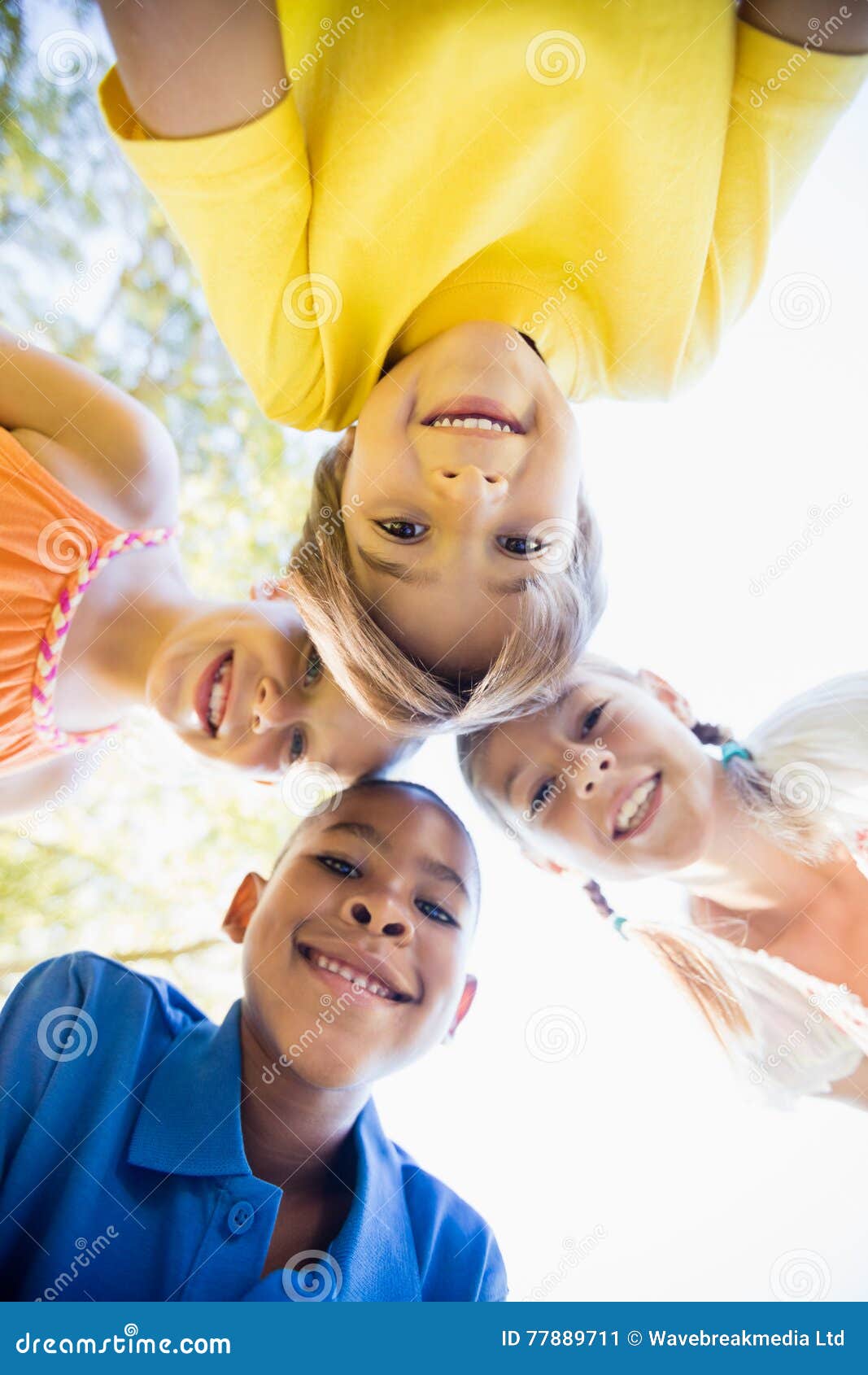 Miling Children Forming a Huddle in Circle Stock Image - Image of park ...