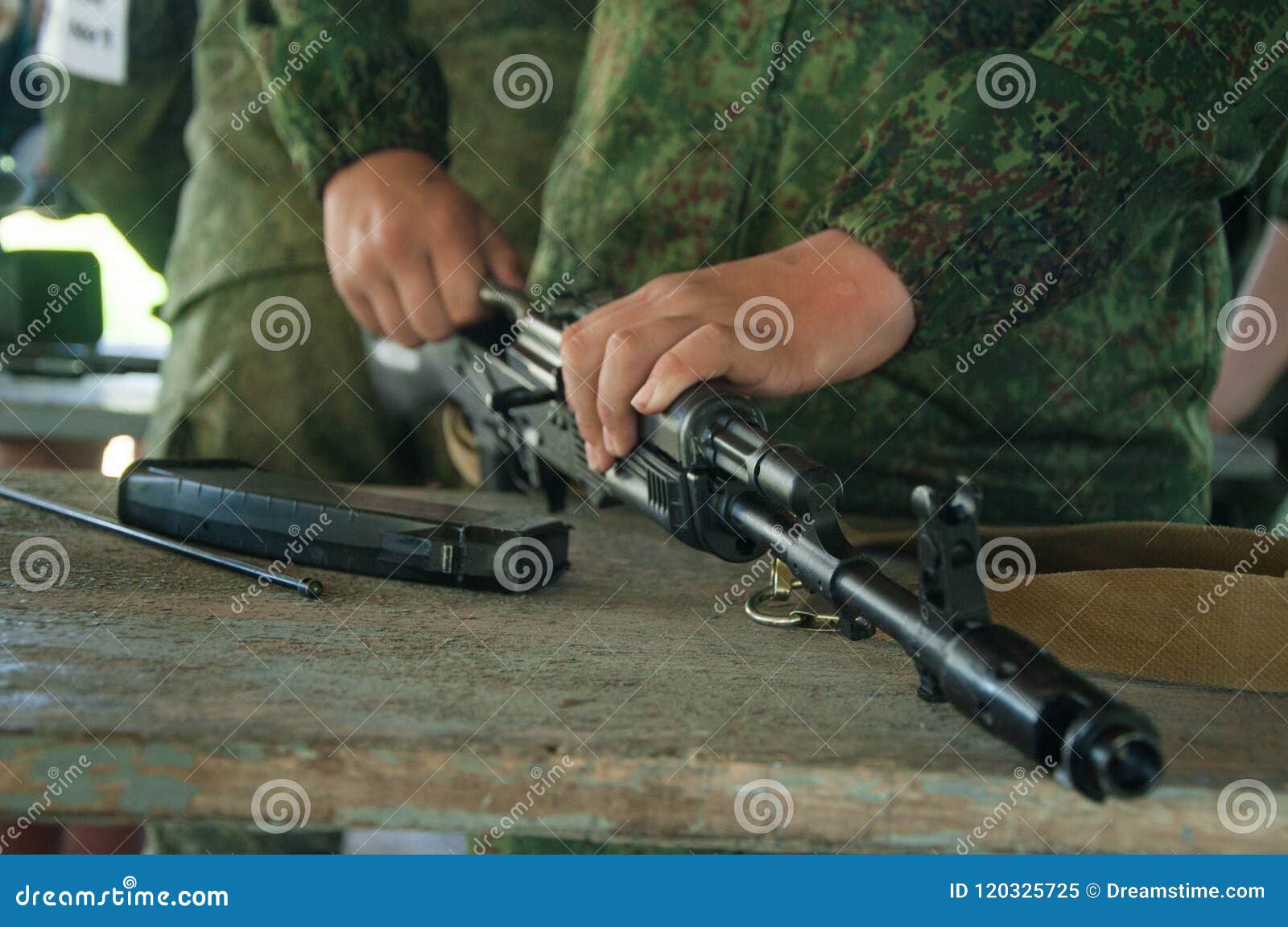 Military Camp. Assembling an Automatic Gun Stock Image - Image of ...
