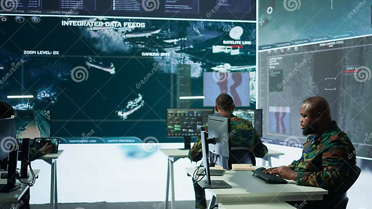 Military Crew in a High Tech Operations Command Post Managing ...