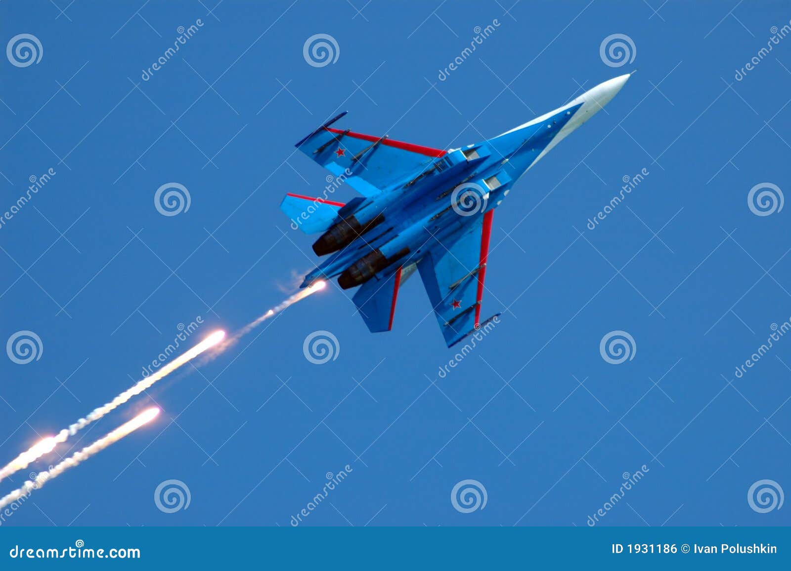 Military Fighter Jet In Combat Flight Firing Off Countermeasure Decoy ...