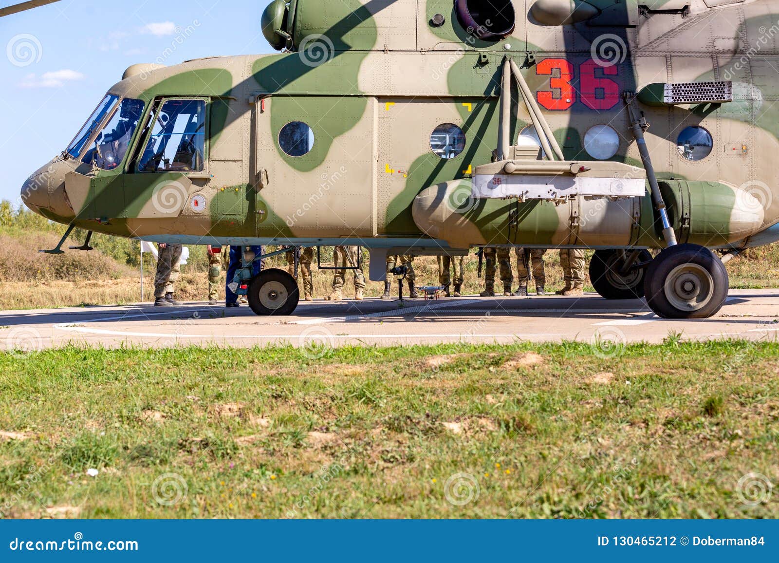 Military Helicopter Lands on the Ground during Military Exercise Stock ...
