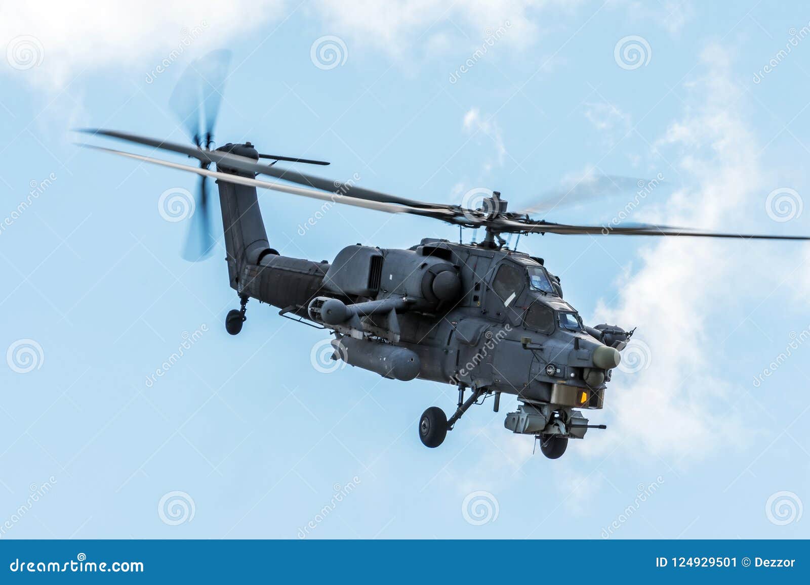 Military Helicopter in the Sky on a Combat Mission with Weapons. Stock ...