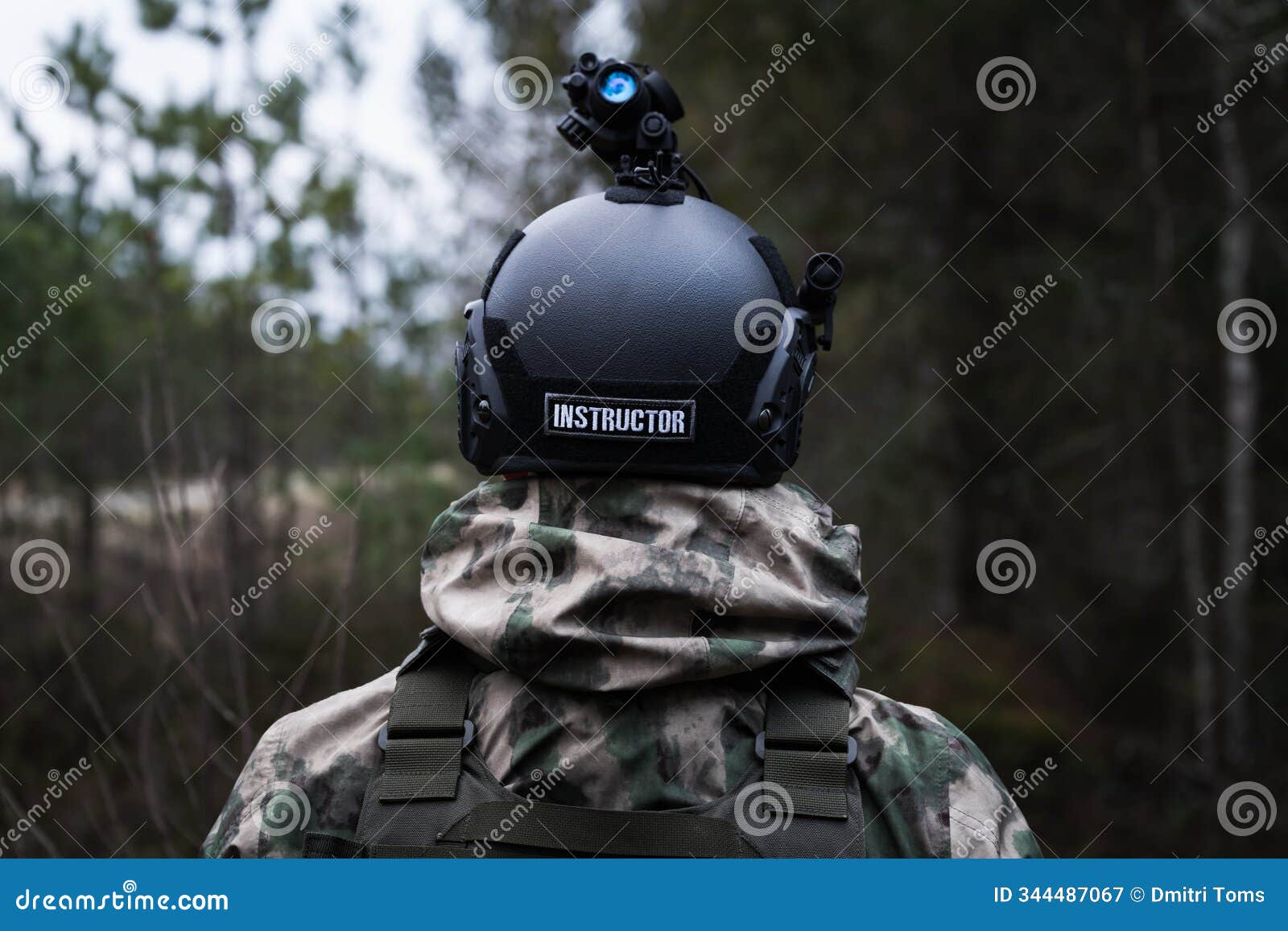 Military Instructor in a Helmet with a Night Vision Device in the ...