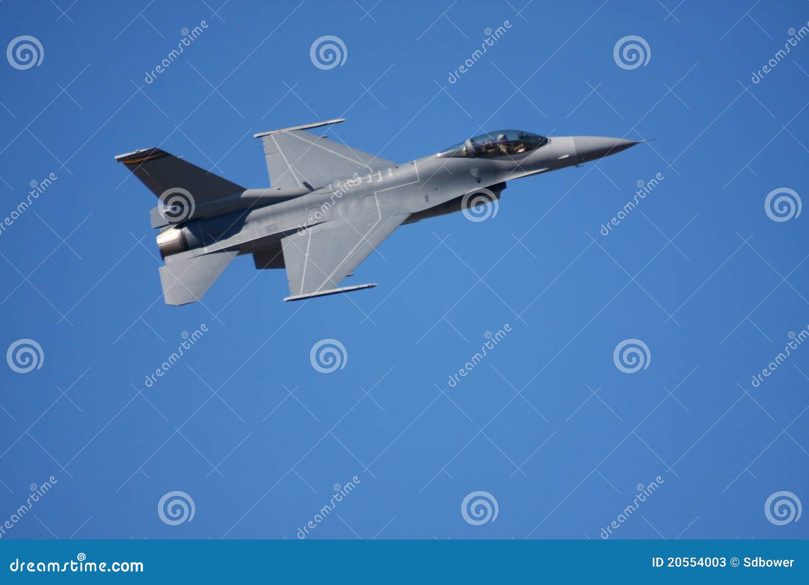 Military Jet Flying in a Blue Sky Stock Image - Image of tecnology ...