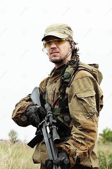 Military man stock photo. Image of camouflage, arms, national - 10917276