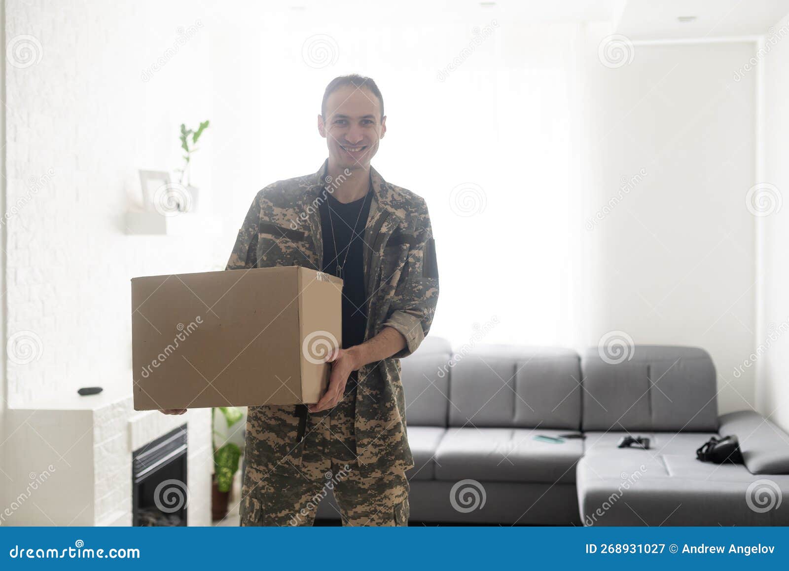 Military man with a box stock image. Image of parcels - 268931027