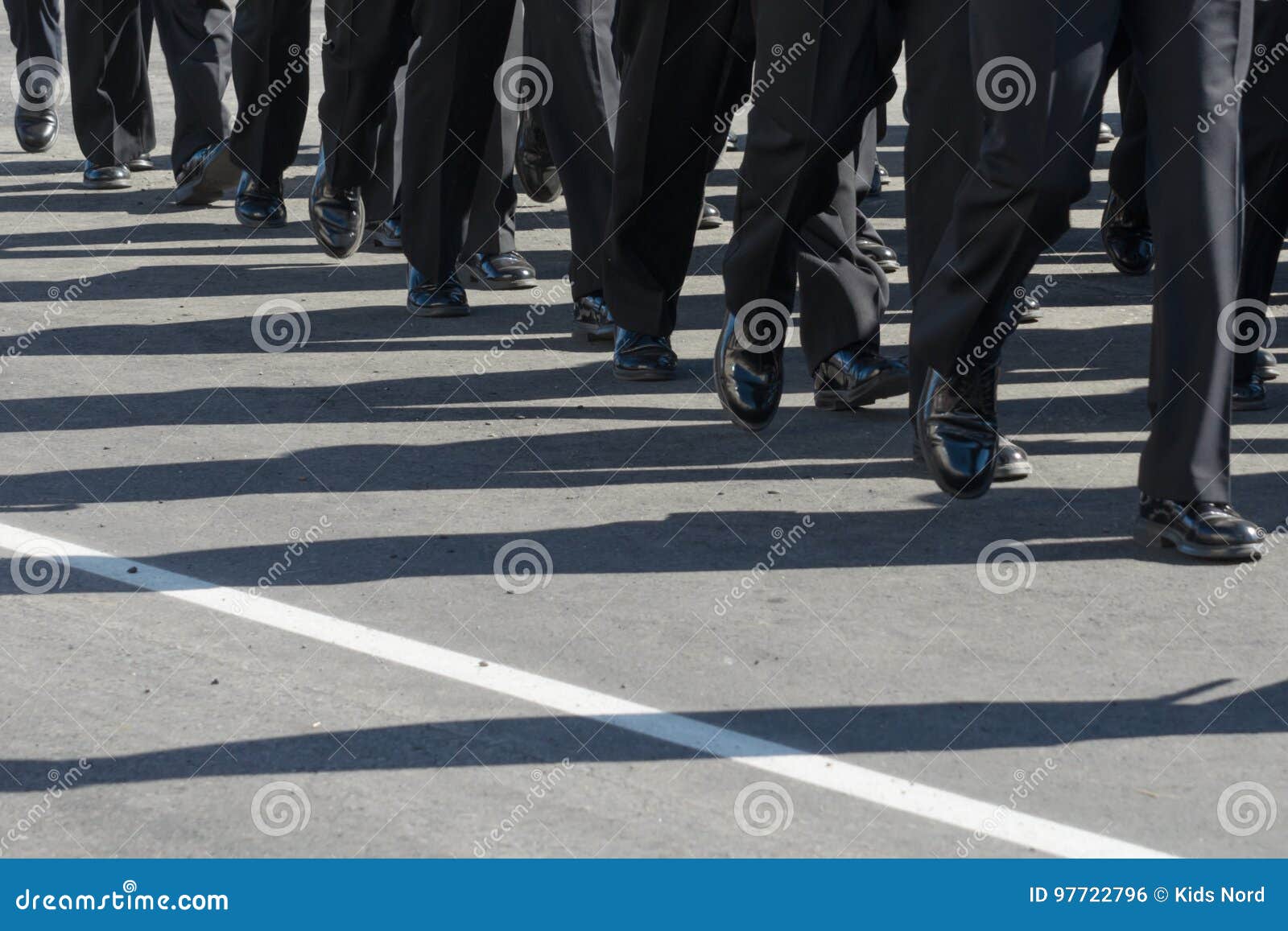 Military Marching Formation.Shadows on the Road Stock Photo - Image of ...
