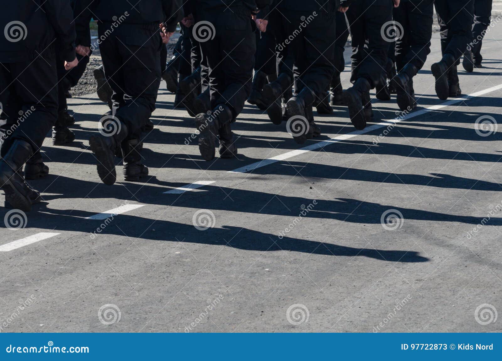 Military Marching Formation.Shadows on the Road Stock Image - Image of ...