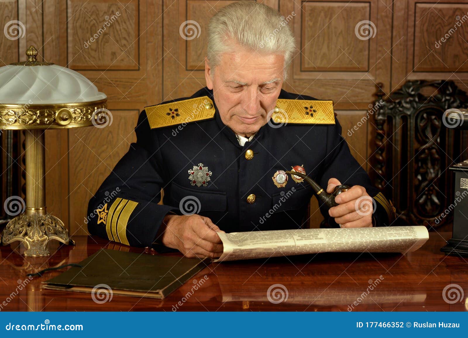 Military Mature General at the Table with Newspaper Stock Photo - Image ...
