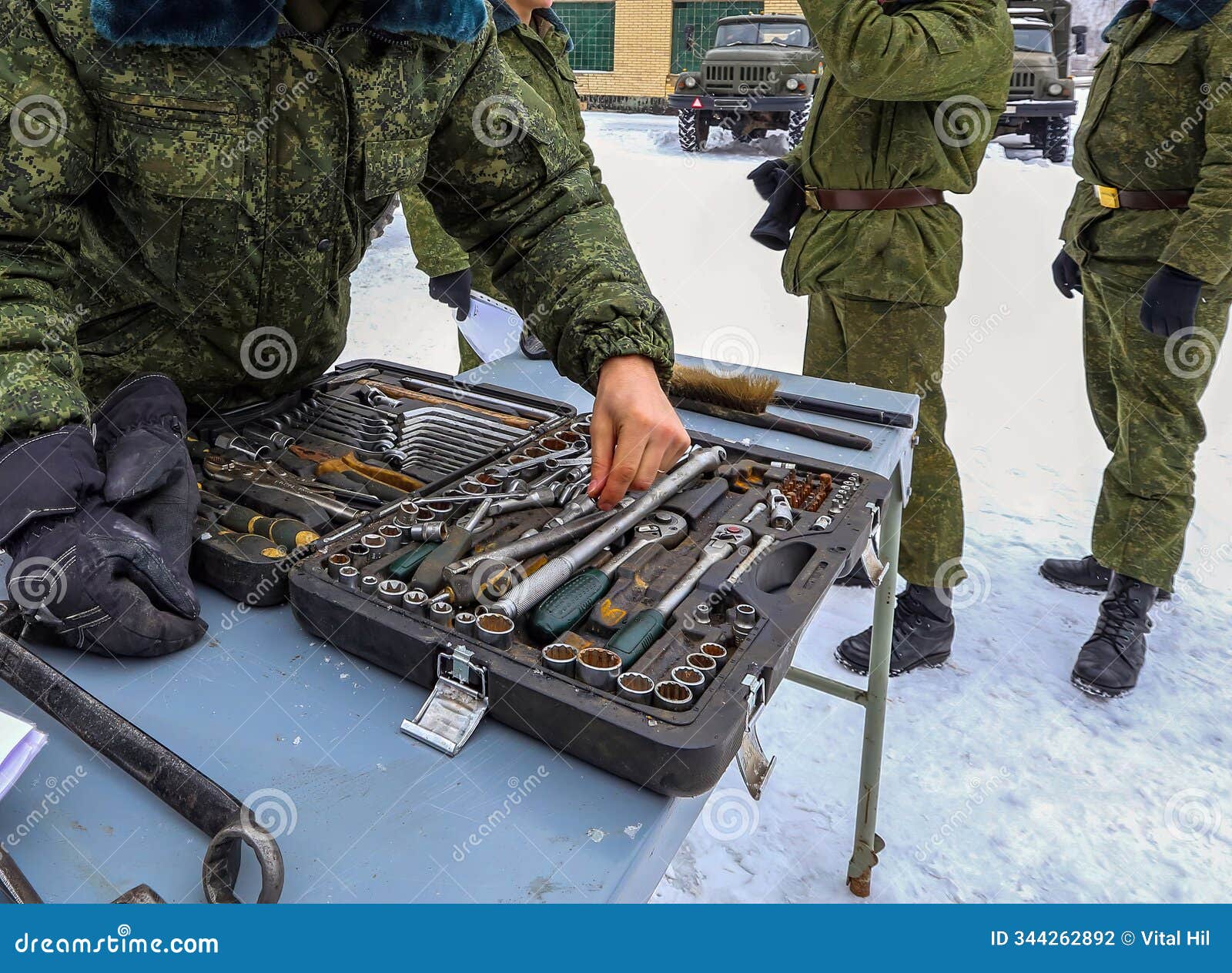 Military Personnel Organize Various Tools during Winter Training ...