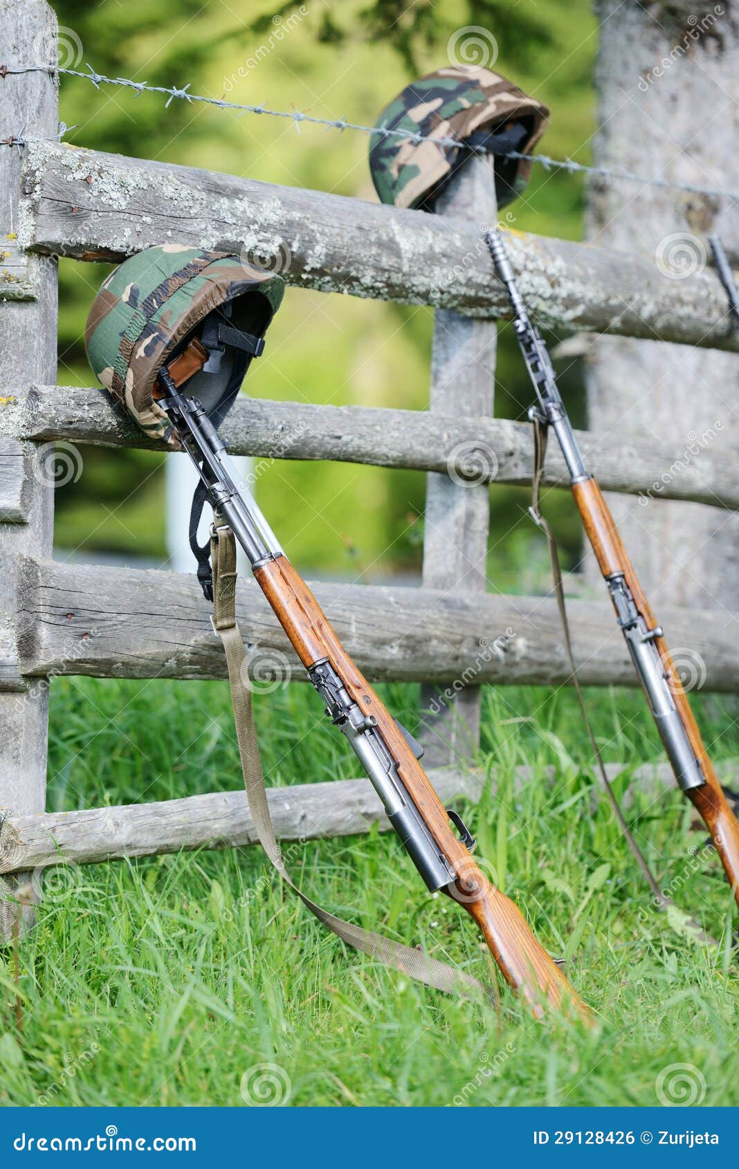 Military rifle and helmet stock photo. Image of real - 29128426