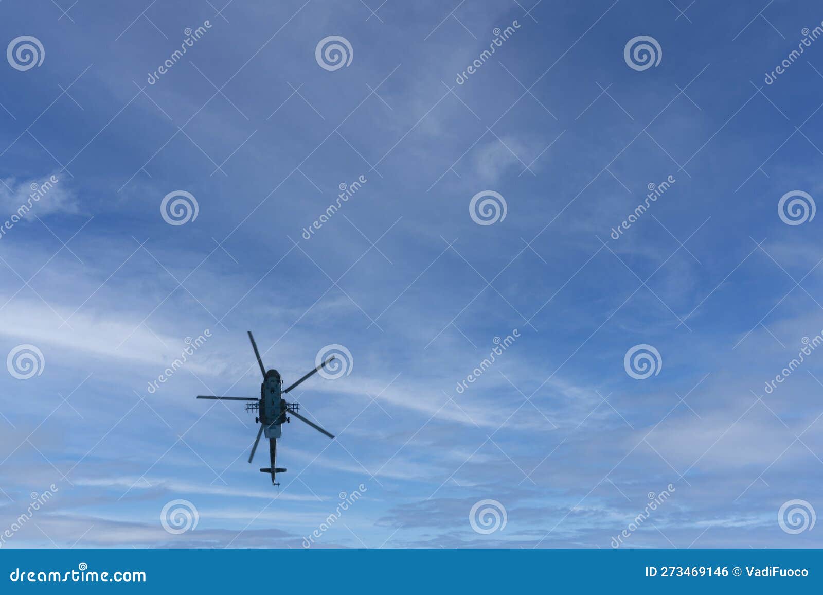 Military Russian Helicopter Flies in the Sky. Bottom View Stock Photo ...